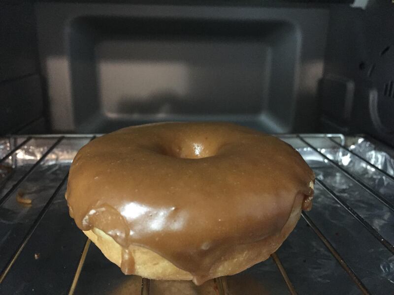 What is the meaning of "Would you like me to heat up your donut ...