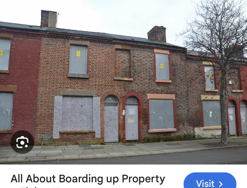 What's the meaning of "boarded up" in the example below? "Not really no ...