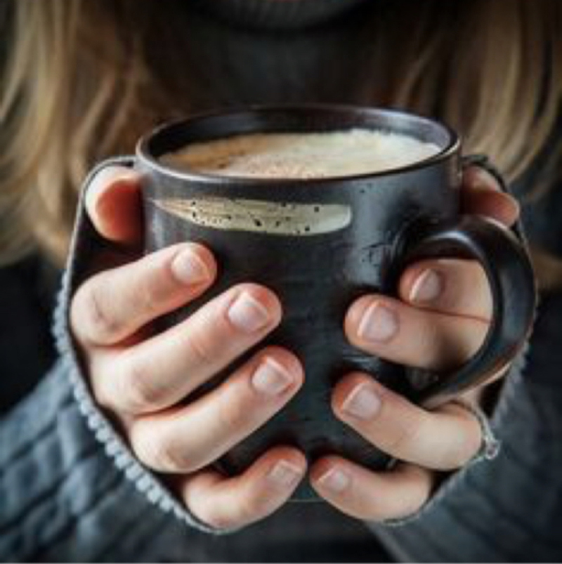 What is the meaning of "cupped Tommy's urn with his hands"? - Question ...