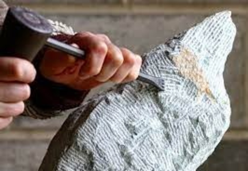 What is the meaning of "start chipping away at the bust"? - Question ...